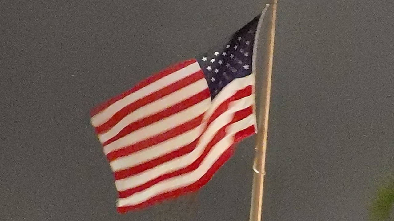 Rippling US flag causes flap at North Dakota condominium - 93Q Country